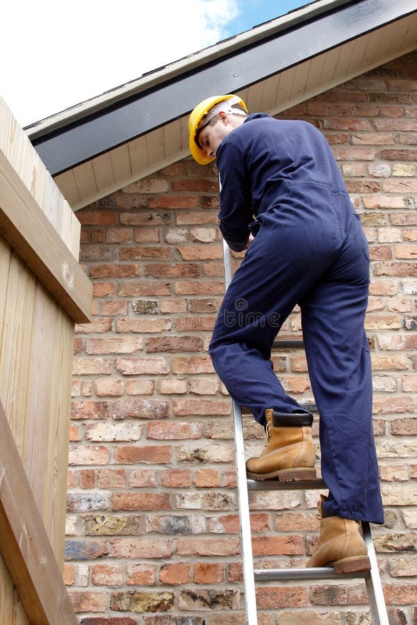 Workman climbing a ladder stock image. Image of climbing - 6269013