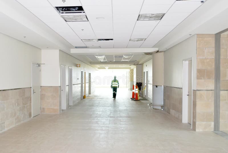 Workman Walking in His Workspace. Stock Image - Image of architecture ...