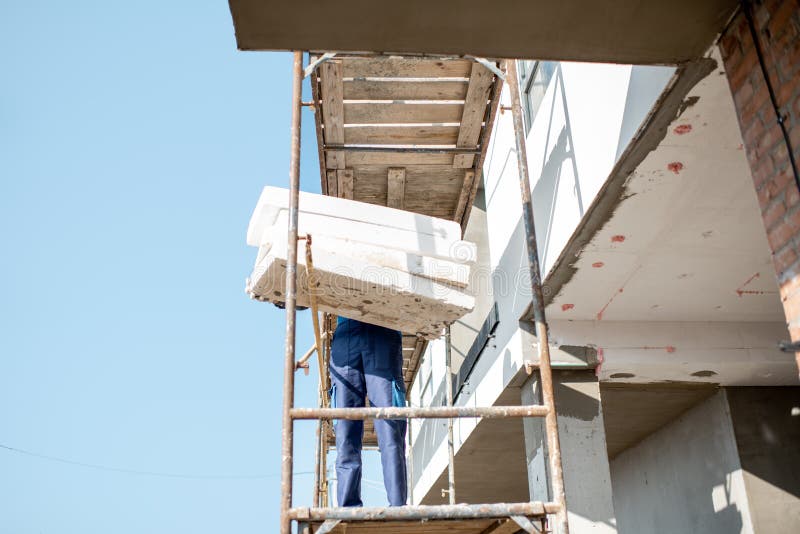 Workman Warming Building Facade Stock Photo - Image of installation ...