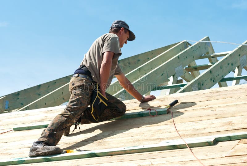 Man working on roof stock image. Image of laborer, outdoors - 16263895