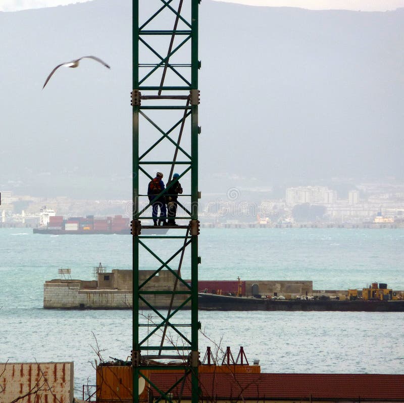 Workmen aloft stock image. Image of helmeted, high, hard - 87372605