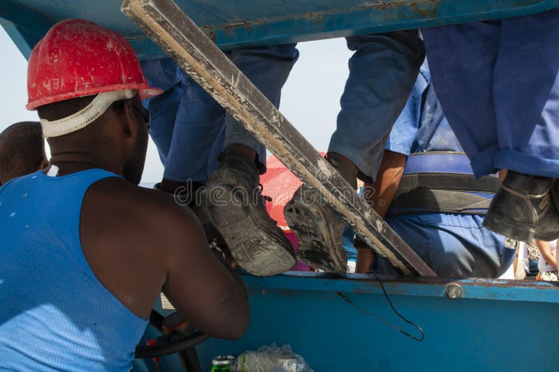 Workmen Sitting on a Crane Resting Editorial Stock Image - Image of ...