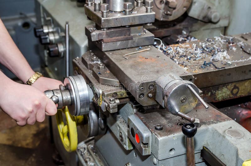 Workmen Working on Industrial Lathe Stock Photo - Image of group ...