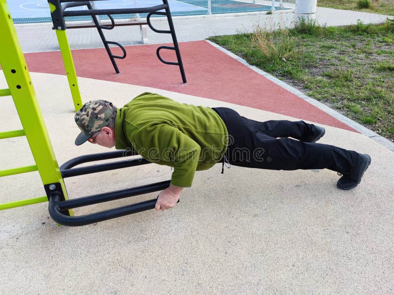 Man Doing Push-ups on the Street Sports Ground Stock Image - Image of ...