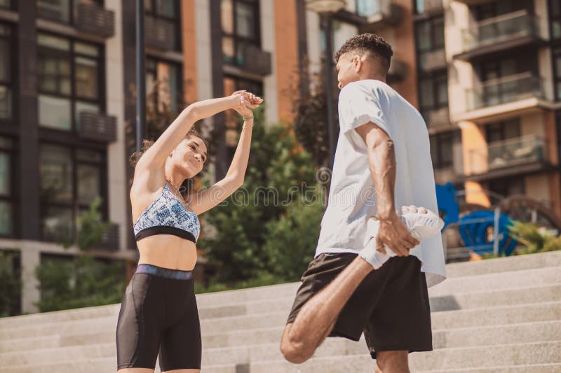 Young People Having Workout Together and Looking Involved Stock Image ...