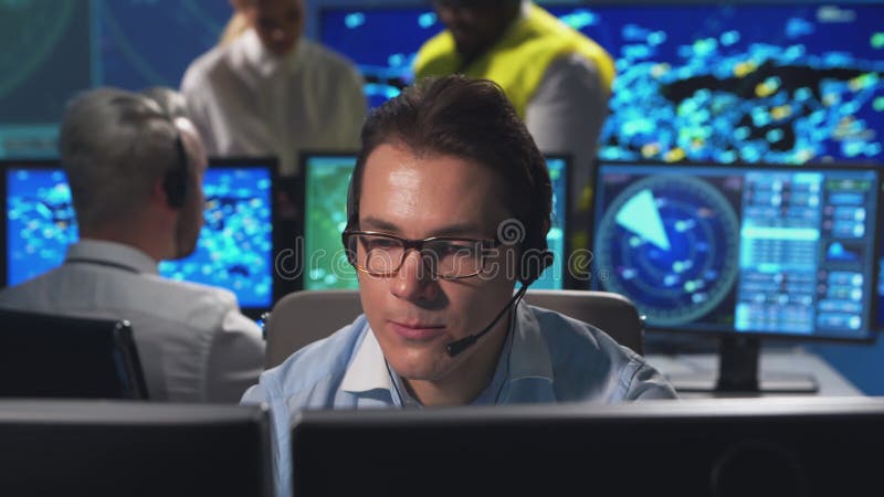 Workplace of the Air Traffic Controllers in the Control Tower. Team of ...