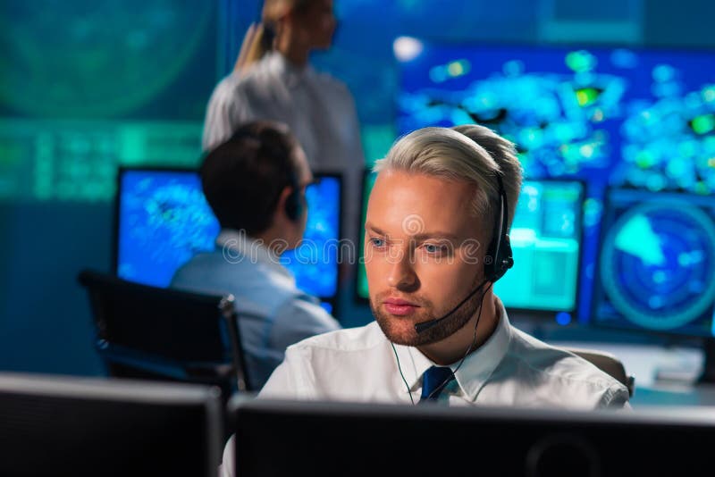 Workplace of the Air Traffic Controllers in the Control Tower. Diverse ...