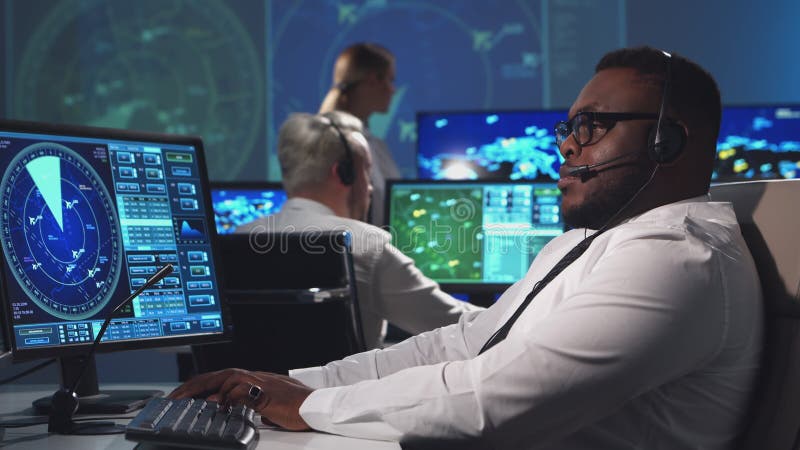 Workplace of the Air Traffic Controllers in the Control Tower. Diverse ...