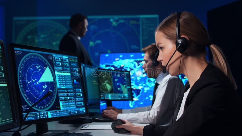 Workplace of the Air Traffic Controllers in the Control Tower. Team of ...
