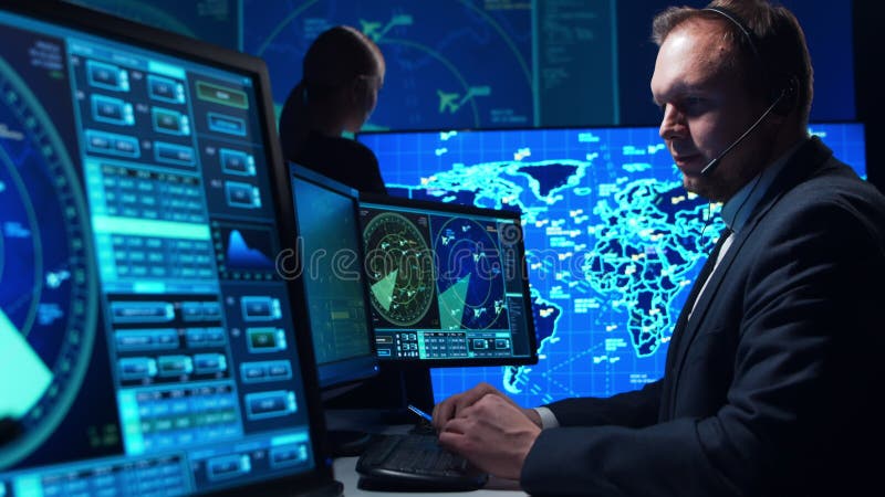 Workplace of the Air Traffic Controllers in the Control Tower. Team of ...