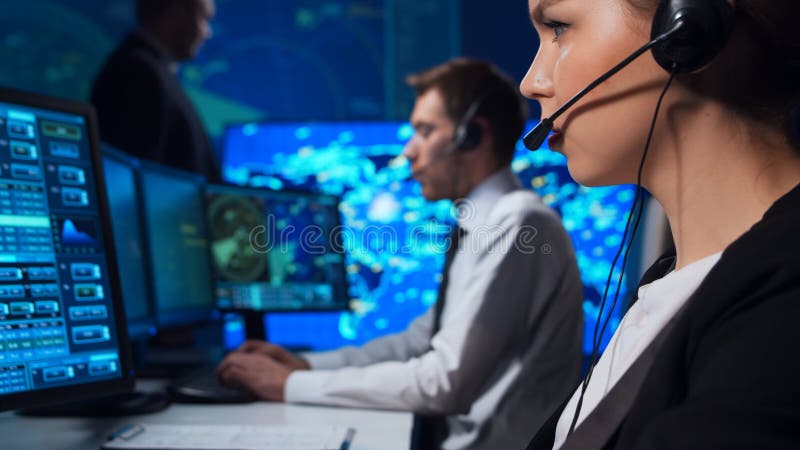Workplace of the Air Traffic Controllers in the Control Tower. Team of ...