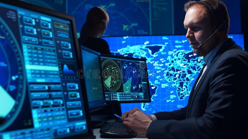 Workplace of the Air Traffic Controllers in the Control Tower. Team of ...