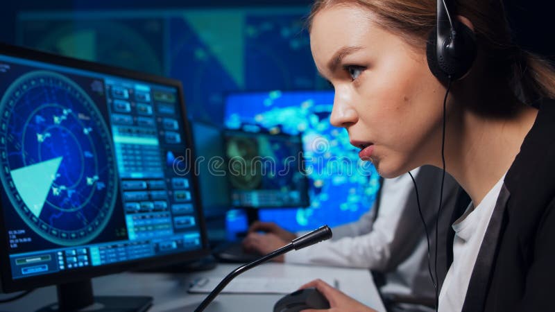 Workplace of the Air Traffic Controllers in the Control Tower. Team of ...