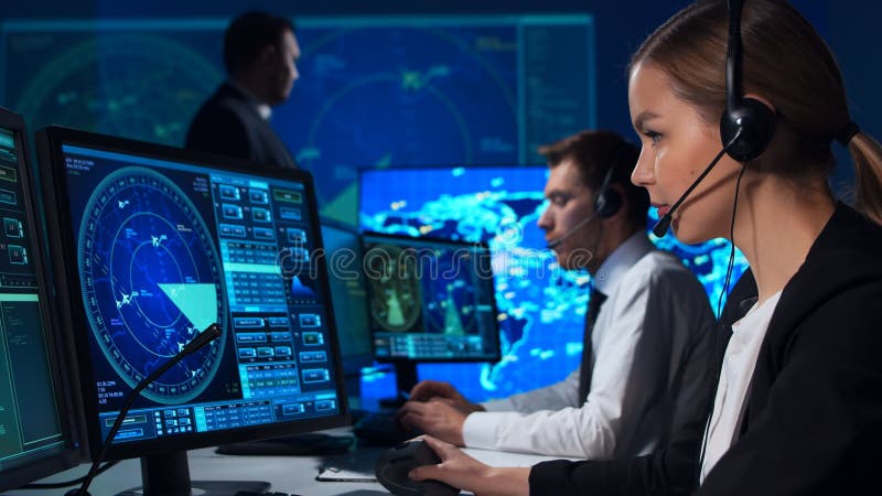 Workplace of the Air Traffic Controllers in the Control Tower. Team of ...