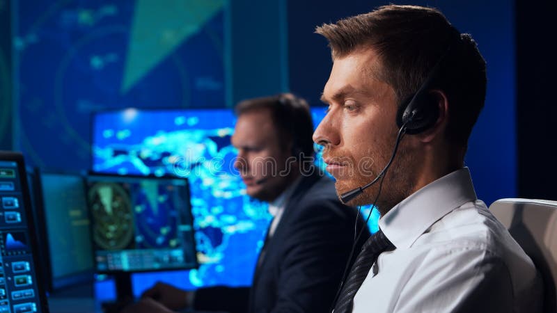 Workplace of the Air Traffic Controllers in the Control Tower. Team of ...