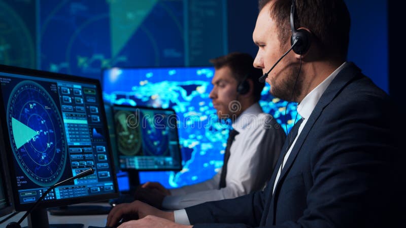 Workplace of the Air Traffic Controllers in the Control Tower. Team of ...