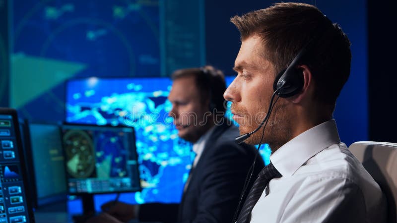 Workplace of the Air Traffic Controllers in the Control Tower. Team of ...