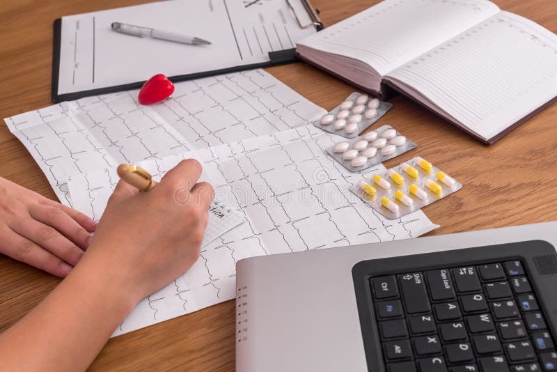 Workplace of Cardiologist with Patient`s Cardiogram and Prescription ...