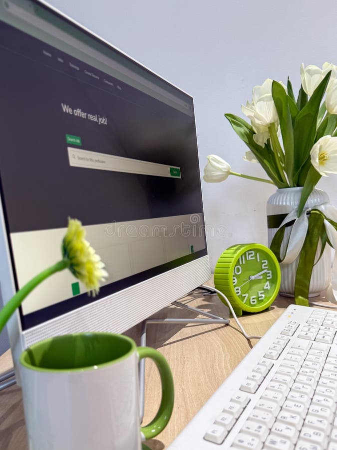 Workplace with Computer, Keyboard, Mouse, Coffee Cup, Clock and Flowers ...