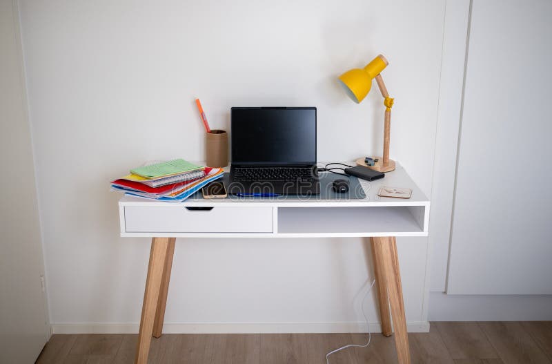 Workplace Desk with Laptop, Yellow Lamp and Notebook at Home. Concept ...