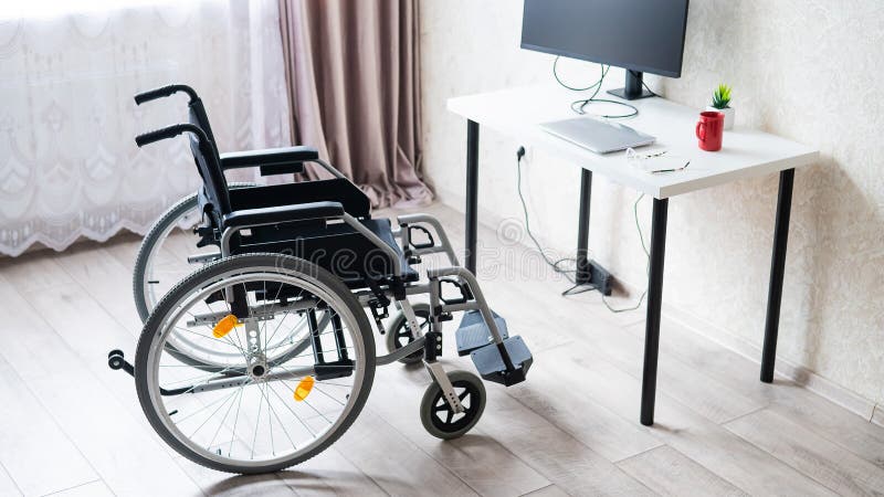 Workplace for a Disabled Person. Wheelchair at the Table with a ...