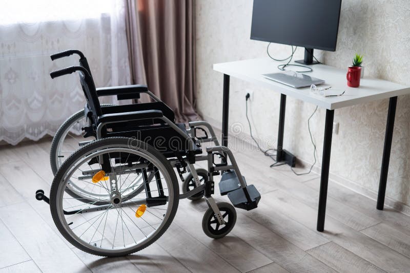 Workplace for a Disabled Person. Wheelchair at the Table with a ...