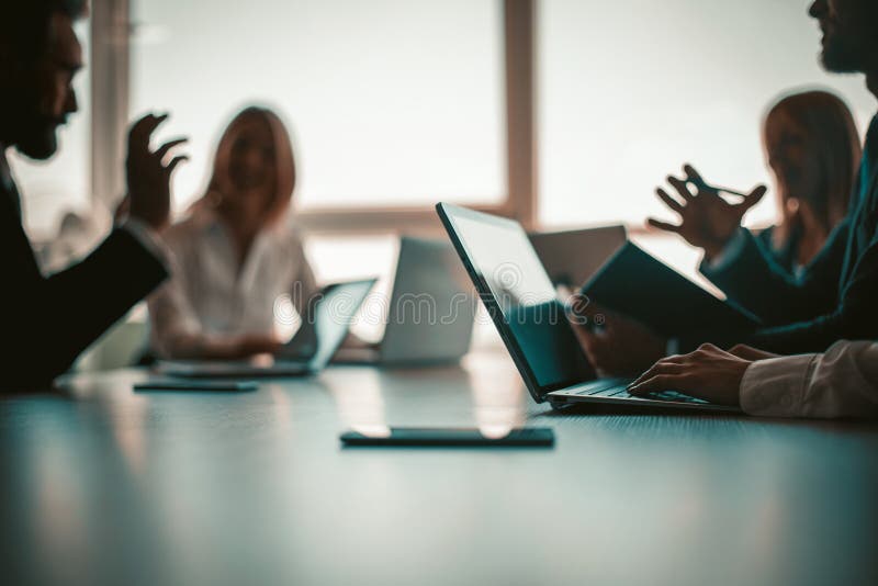 Workplace Employees at the Table are Having a Discussion. they are ...