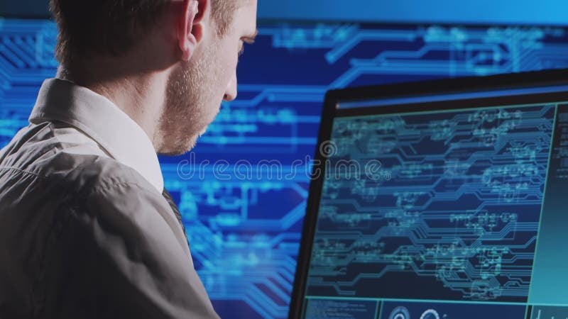 Workplace of an Engineer Developing a Microchip. Professional Coder Works on Modern Technologies ...