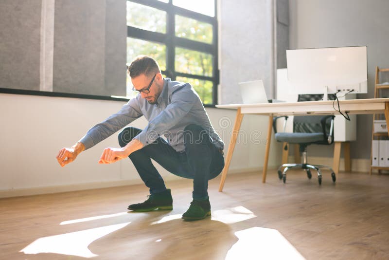 Workplace Exercise at Office Desk Stock Photo - Image of business, male ...