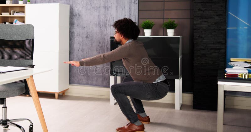 Workplace Exercise at Office Desk Stock Photo - Image of corporate ...