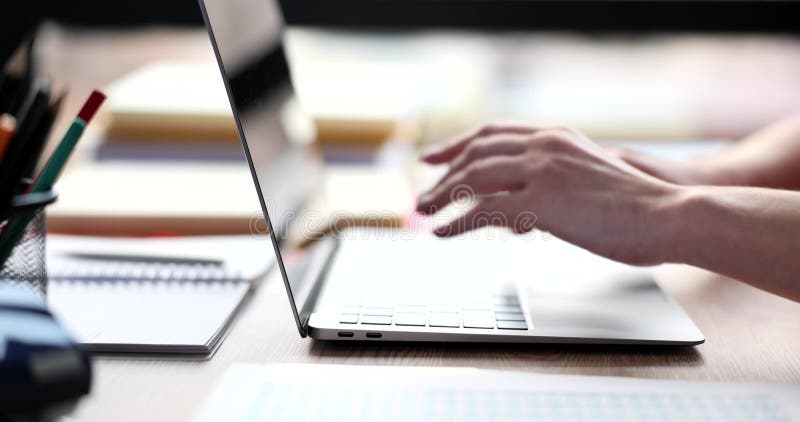 At the Workplace, the Hands Open a Laptop, a Close-up Stock Video ...