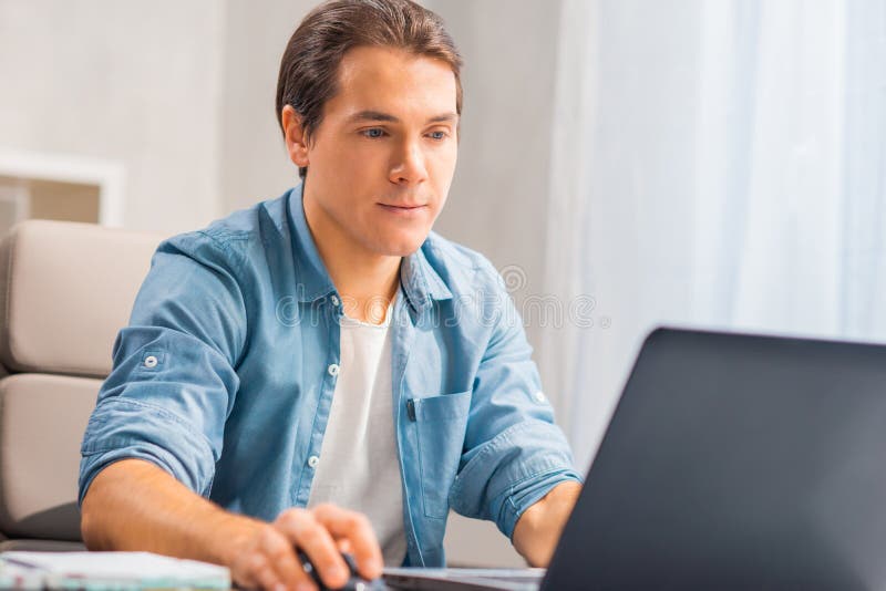 Workplace of Freelance Worker at Home Office. Young Man Works Using ...