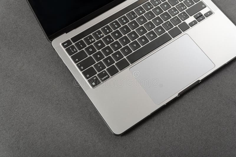 Workplace with Gray Laptop on Black Background, Top View. Laptop ...