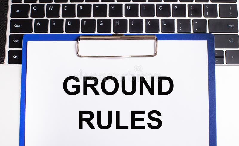 A Workplace with a Keyboard and a Tablet for Papers with GROUND RULES ...