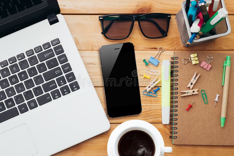 Workplace with Laptop Coffee Phone and Notebook on Wood Table Stock ...
