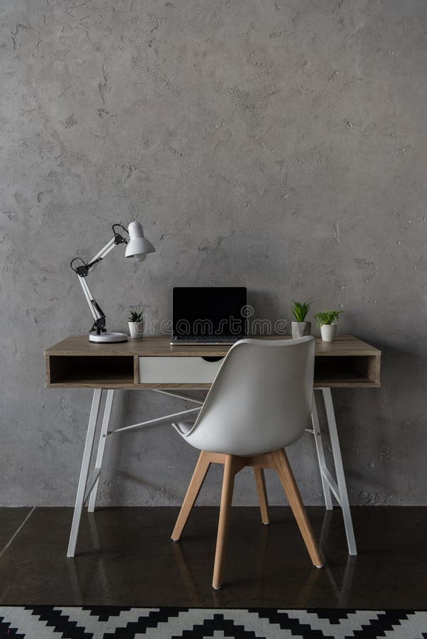 Workplace with Laptop Computer and Flower Pots Stock Image - Image of ...