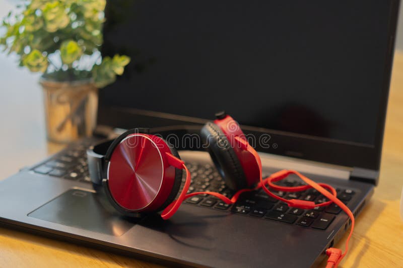 Workplace, Laptop Computer with Headphones Headset. Business ...