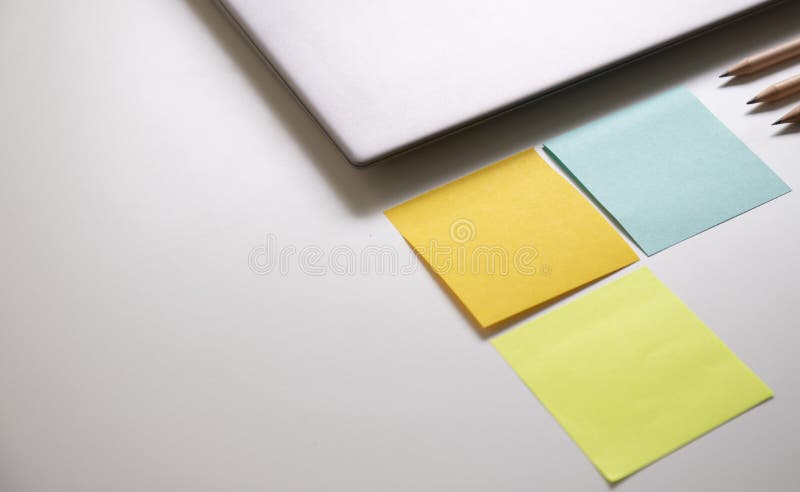 Three Note Pad Paper Near Laptop on the Table Stock Photo - Image of ...