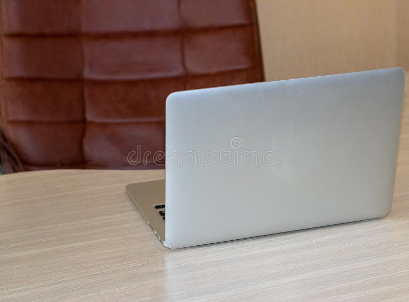 Workplace with a Laptop. a Convenient Desktop for Remote Work Stock ...