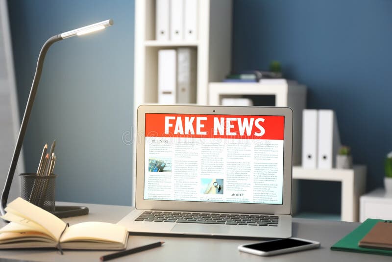 Workplace with Laptop and Fake News on Screen Stock Image - Image of ...