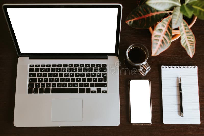 Layout of Laptop and Phone with Pen Planning Notebook and Businessman ...