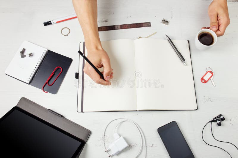 Modern Office Desk with Social Media Tablet, Handy, Notepad and Cup of ...