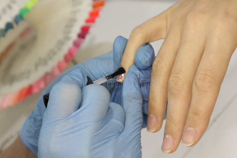 Workplace of a Manicure Master. a Salon Specialist Performs Work with a ...