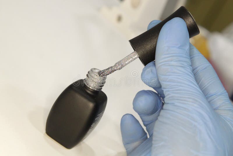 Workplace of a Manicure Master. a Salon Specialist Performs Work with a ...