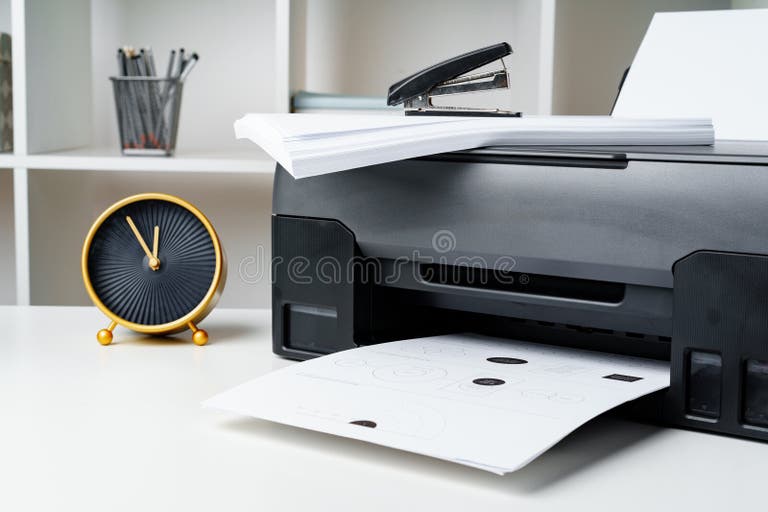 Workplace with Modern Printer and Clock in the Office Stock Photo ...