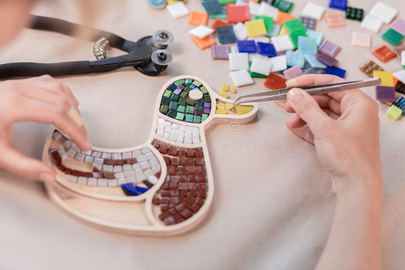 Workplace of the Mosaic Master: Women`s Hands Holding Tool for Mosaic ...