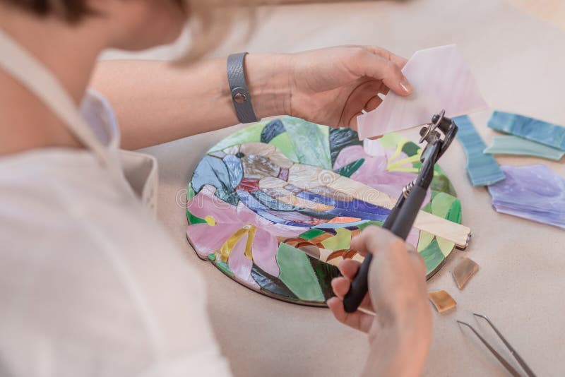 Workplace of the Mosaic Master: Women`s Hands Holding Tool for Mosaic ...