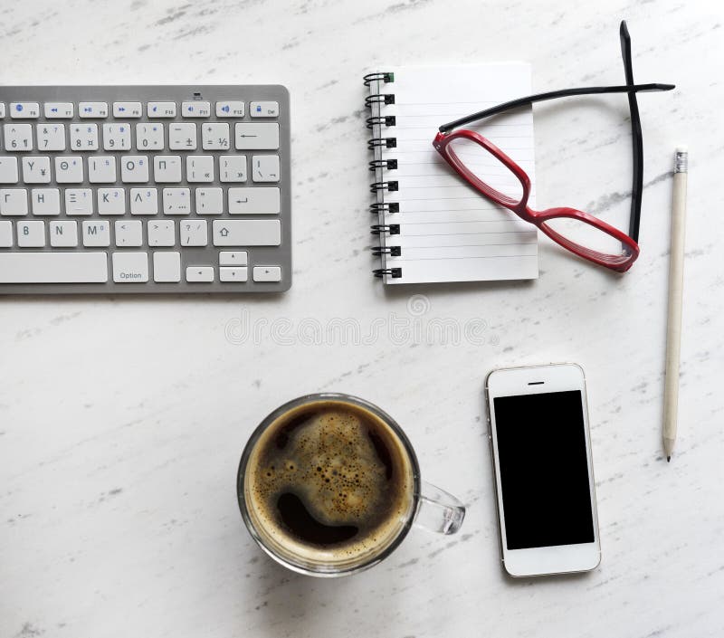Workplace with Notebook, Coffee, Smartphone, Glasses and Keyboard ...