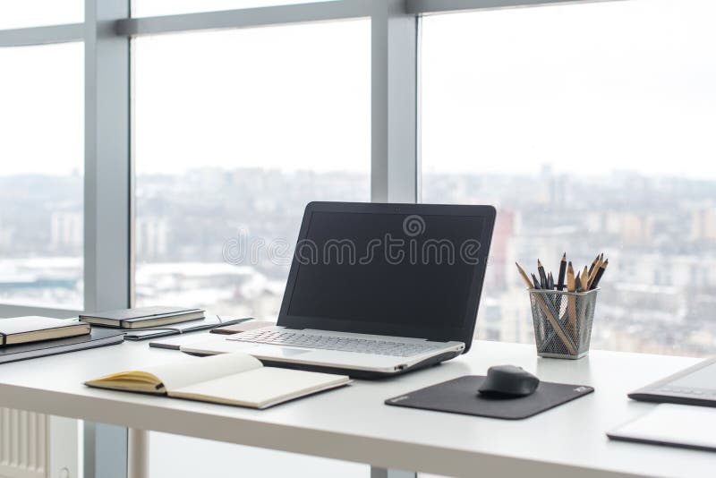 Workplace with Notebook Laptop Comfortable Work Table in Office Windows ...