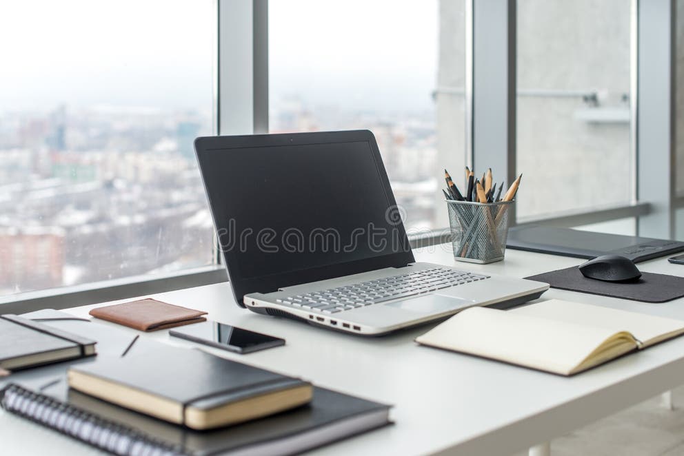 Workplace with Notebook Laptop Comfortable Work Table in Office Windows ...